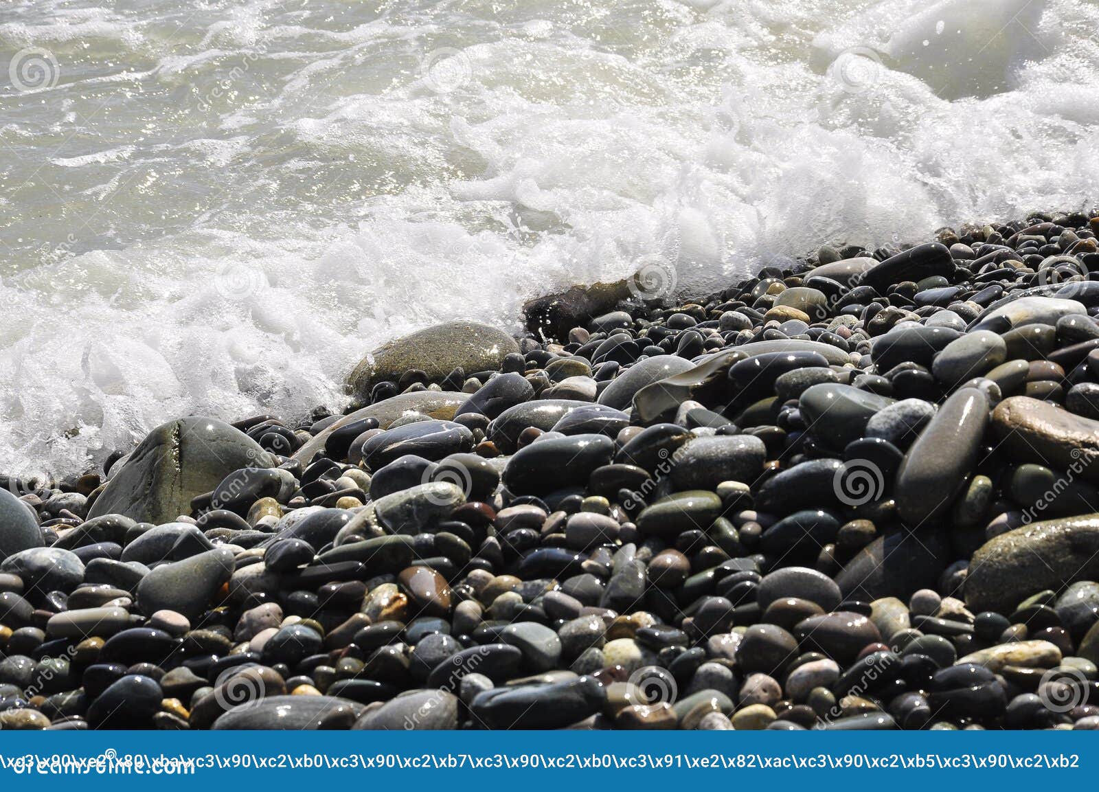 A Wave Breaking on a Pebble Beach, Close-up. Stock Photo - Image of ...