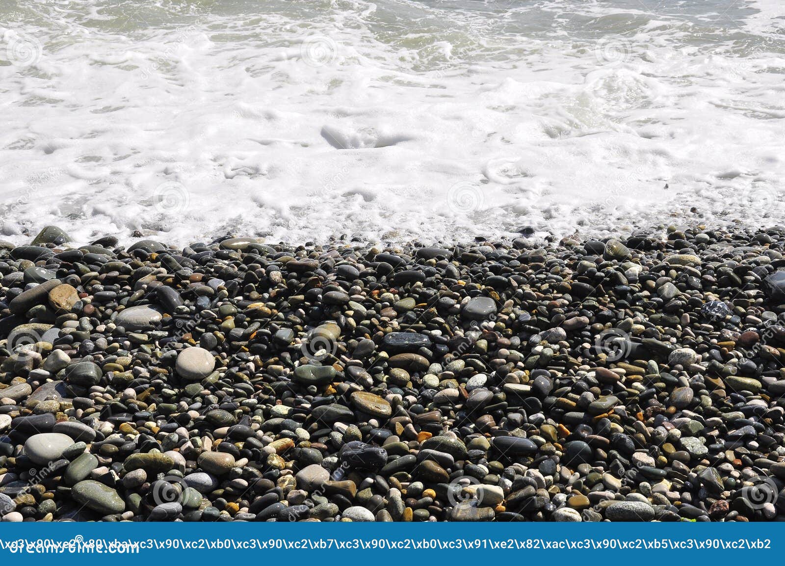 A Wave Breaking on a Pebble Beach, Close-up. Stock Photo - Image of ...