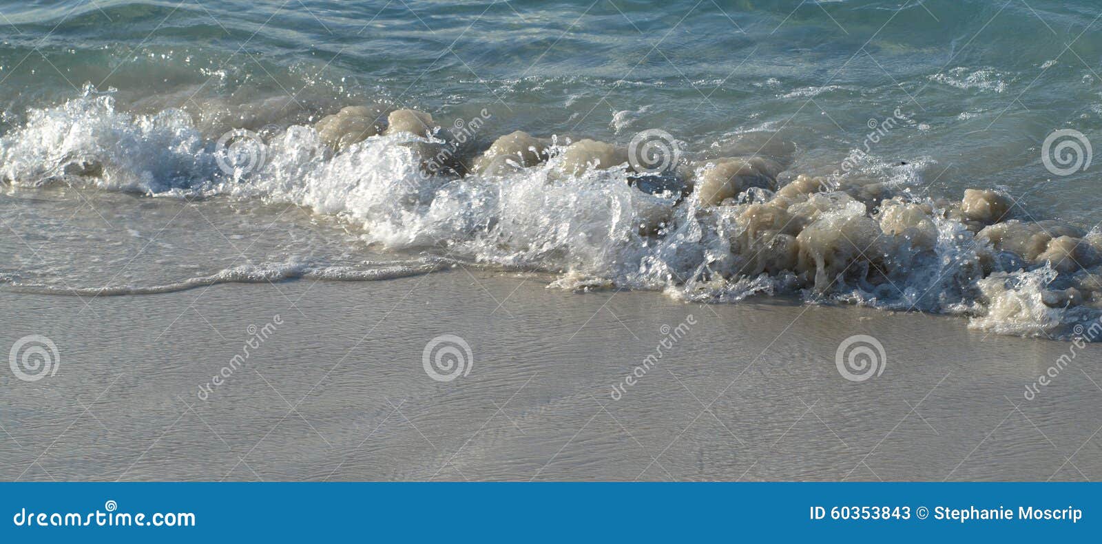 Wave Coming into Shore on Sandy Beach Stock Image - Image of footprints ...