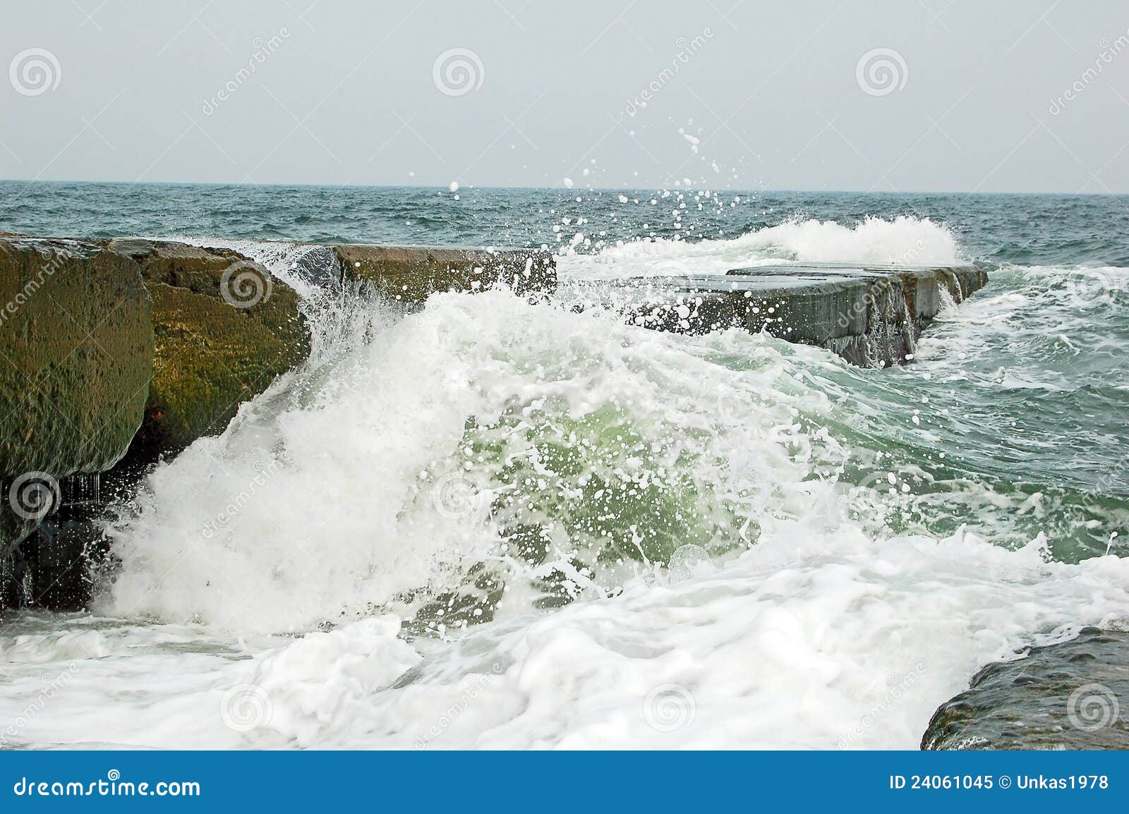Wave Crashing Against the Breakwater Stock Image - Image of line ...