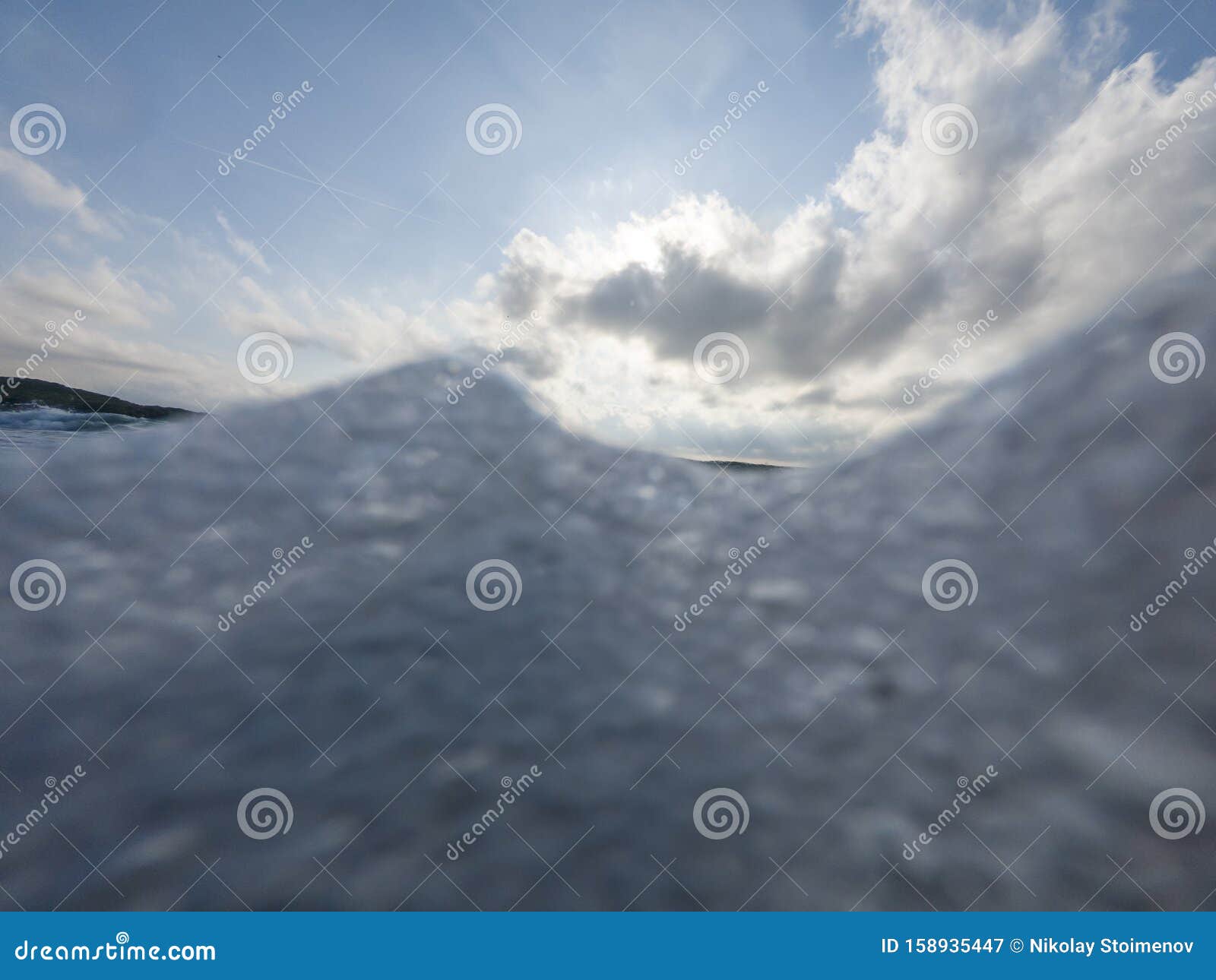 Under a Wave View with Blue Sky and Clouds Stock Image - Image of ...