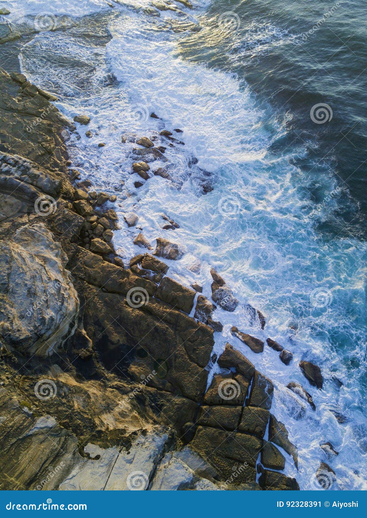 Wave crashing into rocks stock image. Image of outdoors - 92328391