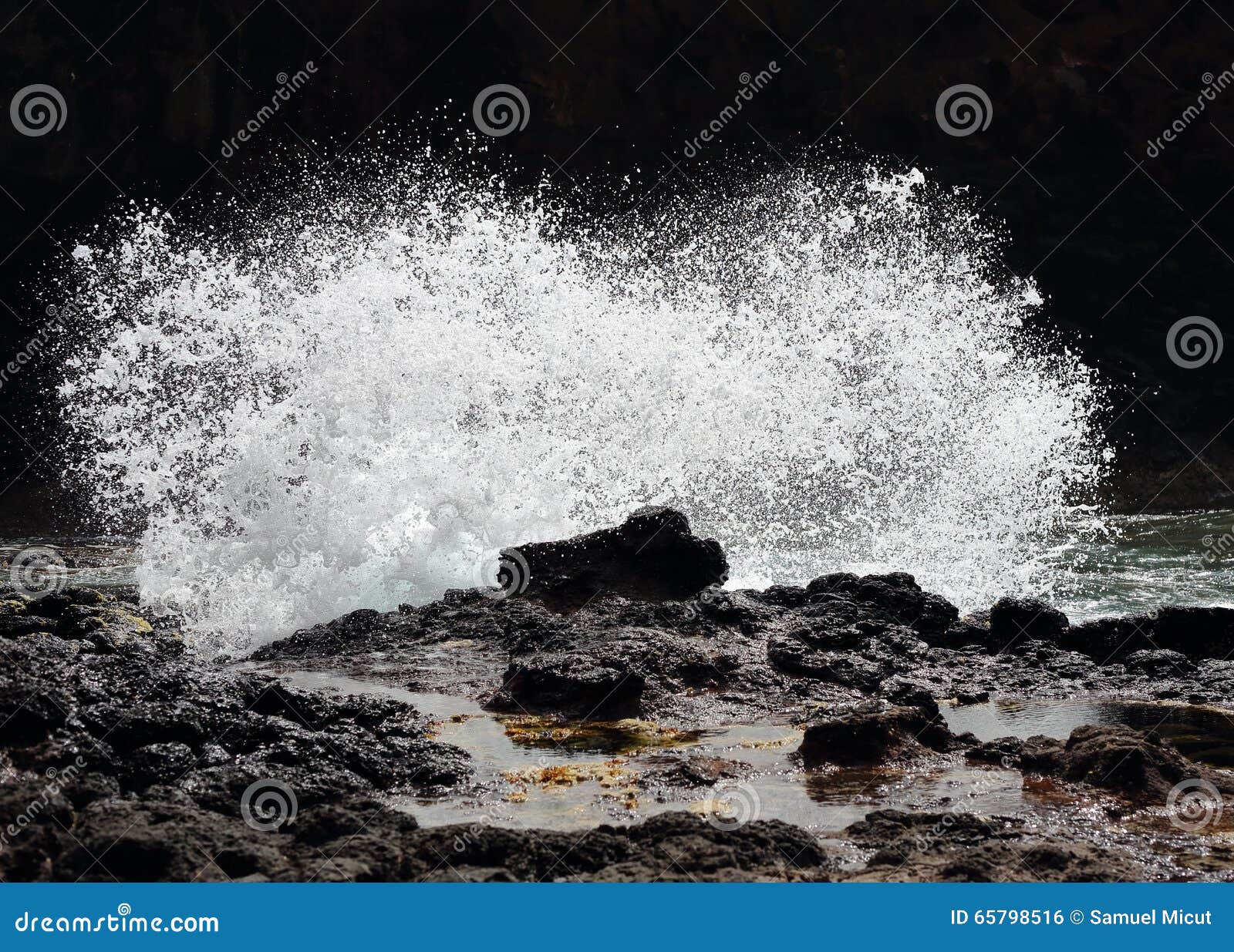 Wave crashing on rocks stock photo. Image of ocean, splashing - 65798516