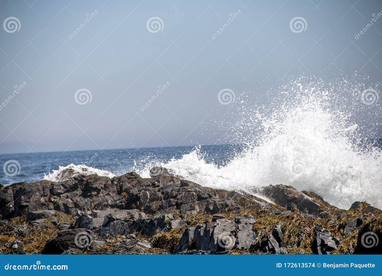 Wave Crashing Up Against the Rocks at the Ocean Stock Photo - Image of ...