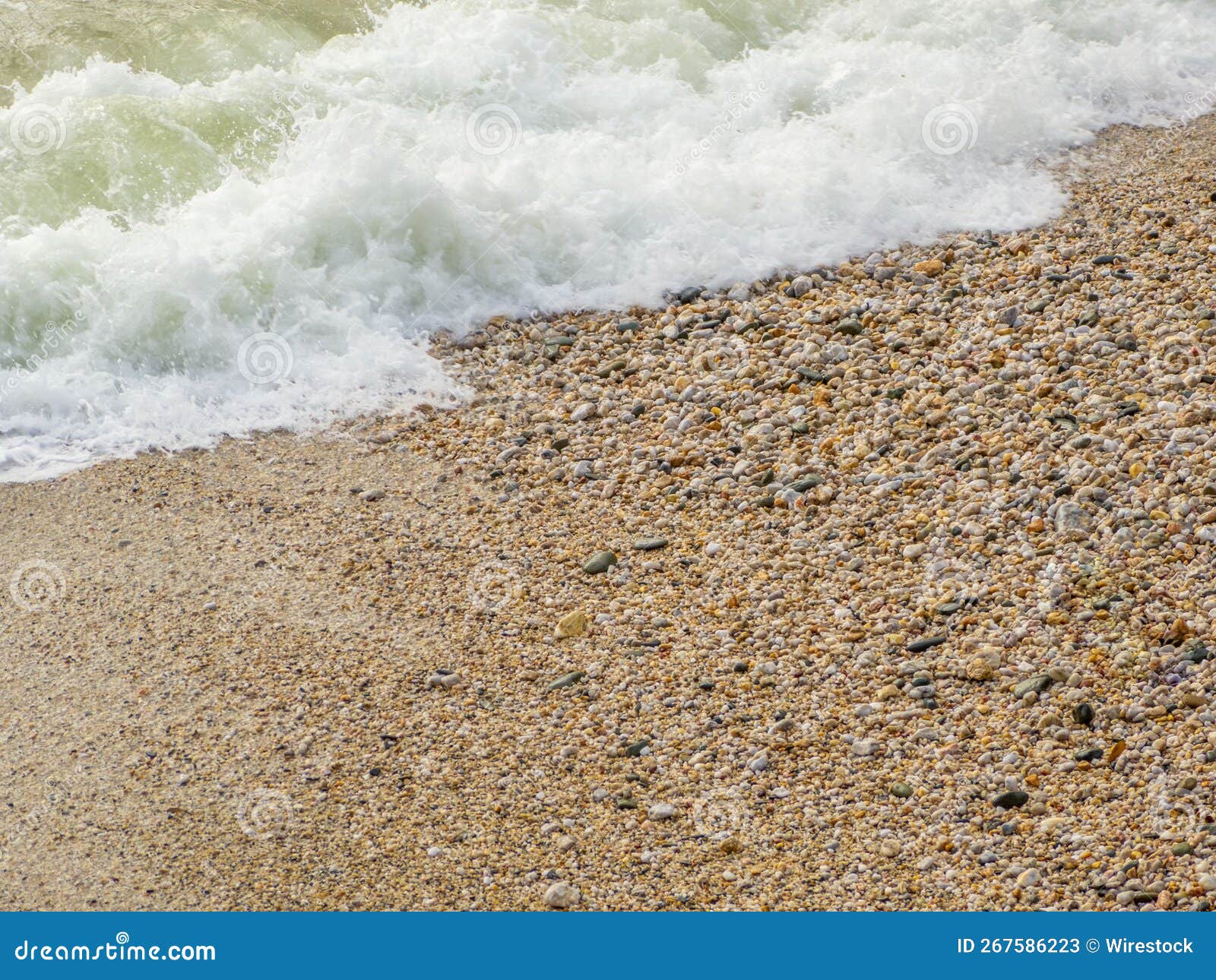 Wave Entering a Stone Beach with Foam Stock Image - Image of wave ...