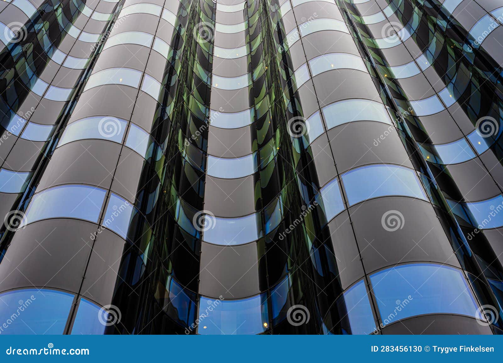 Wave Formed Glass Facade of an Office Building.. Stock Photo - Image of ...