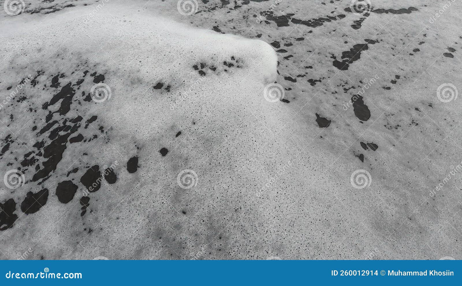 Wave of froth at beach stock photo. Image of froth, winter - 260012914
