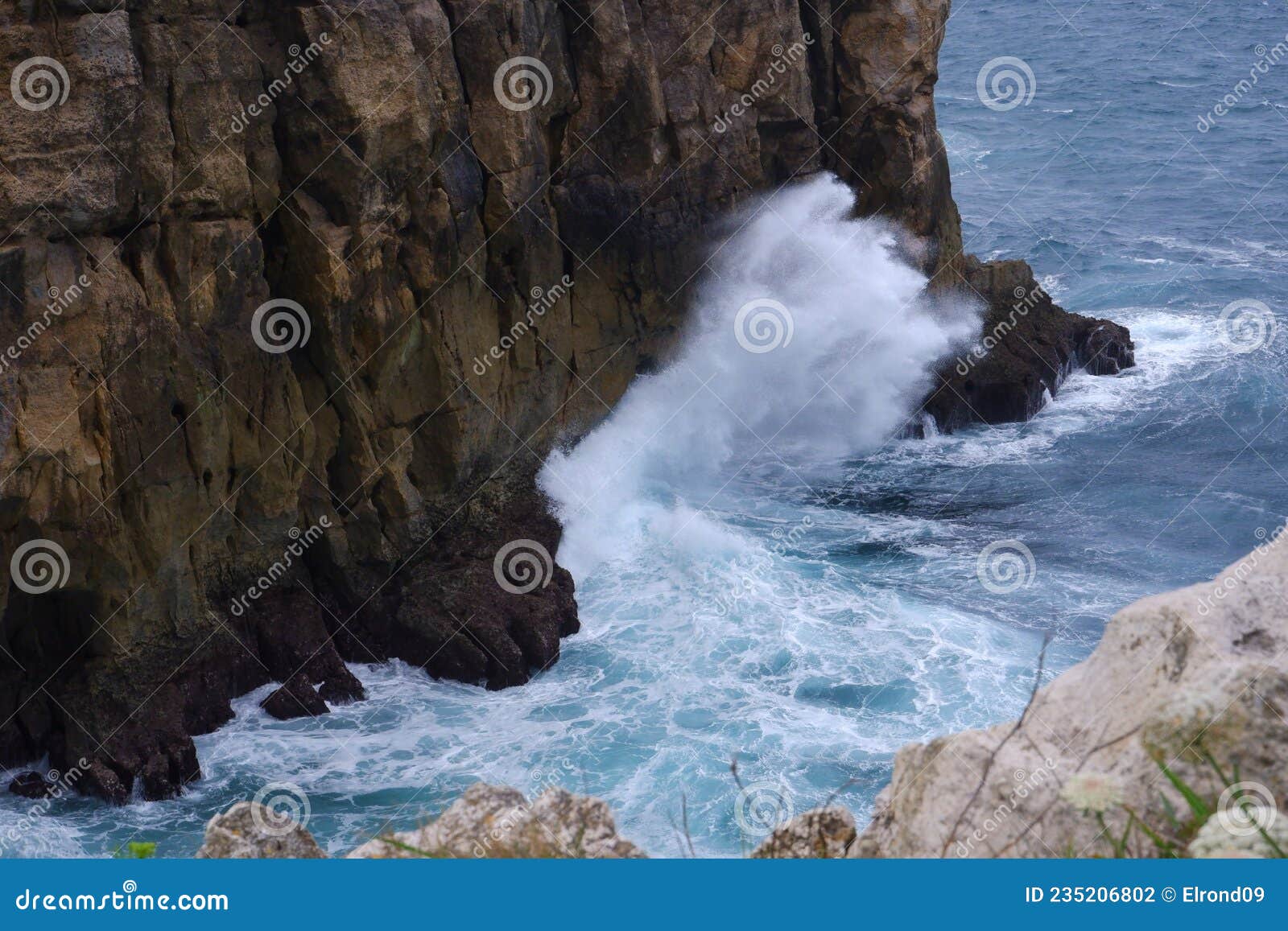 Wave hitting a cliff stock photo. Image of cliff, rock - 235206802