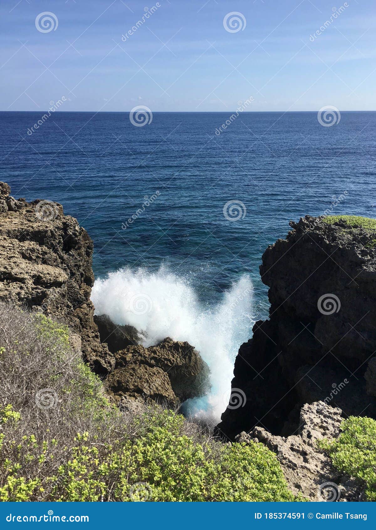Wave Hitting The Rock And Stunning Rock Island With Blue Sky Background ...