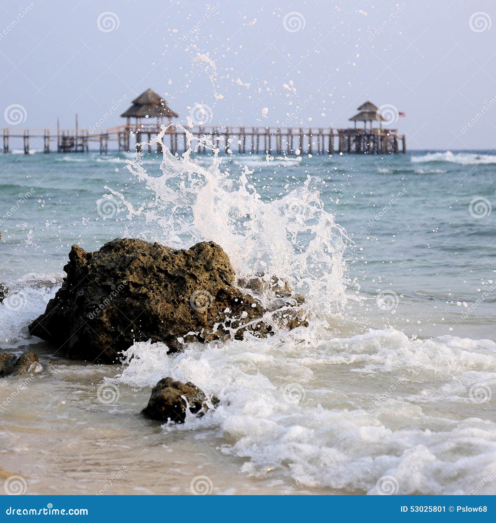 Wave Hitting Rock Royalty-Free Stock Photo | CartoonDealer.com #53025801