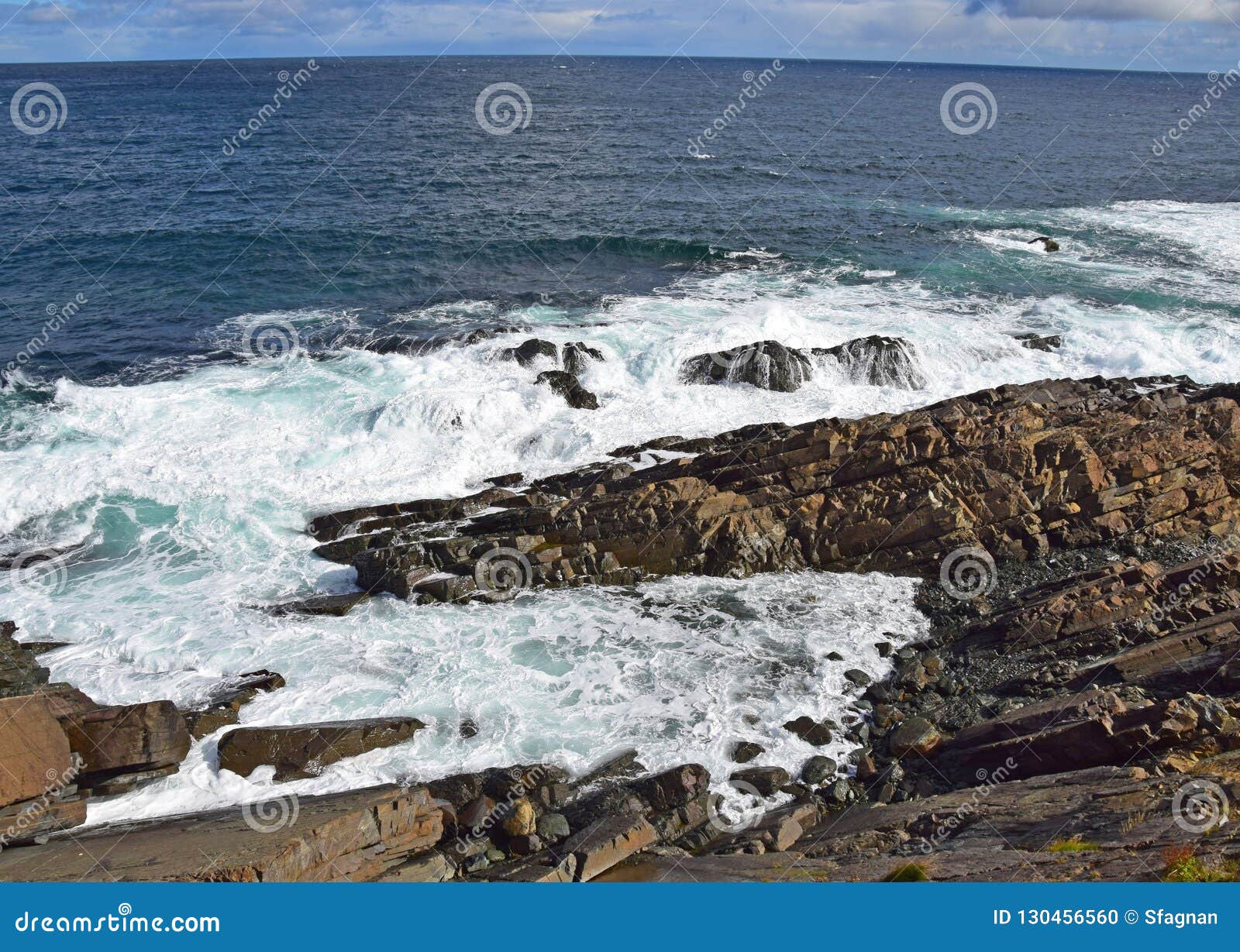 Wave Hitting a Rock in the Ocean Stock Photo - Image of blue, tide ...