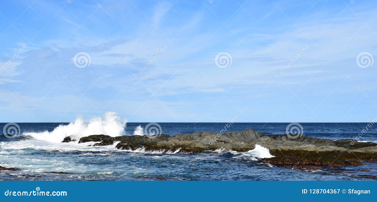 Wave Hitting a Rock in the Ocean Making a Big Splash Stock Image ...