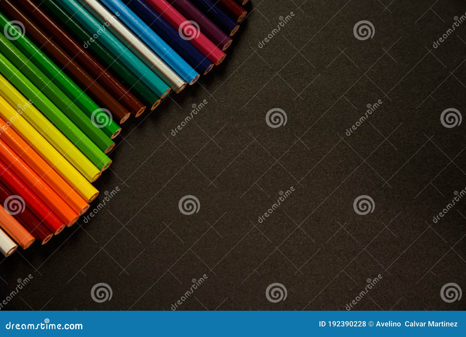 A Wave Made of Colorful Pencils Over a Dark Background Stock Photo ...