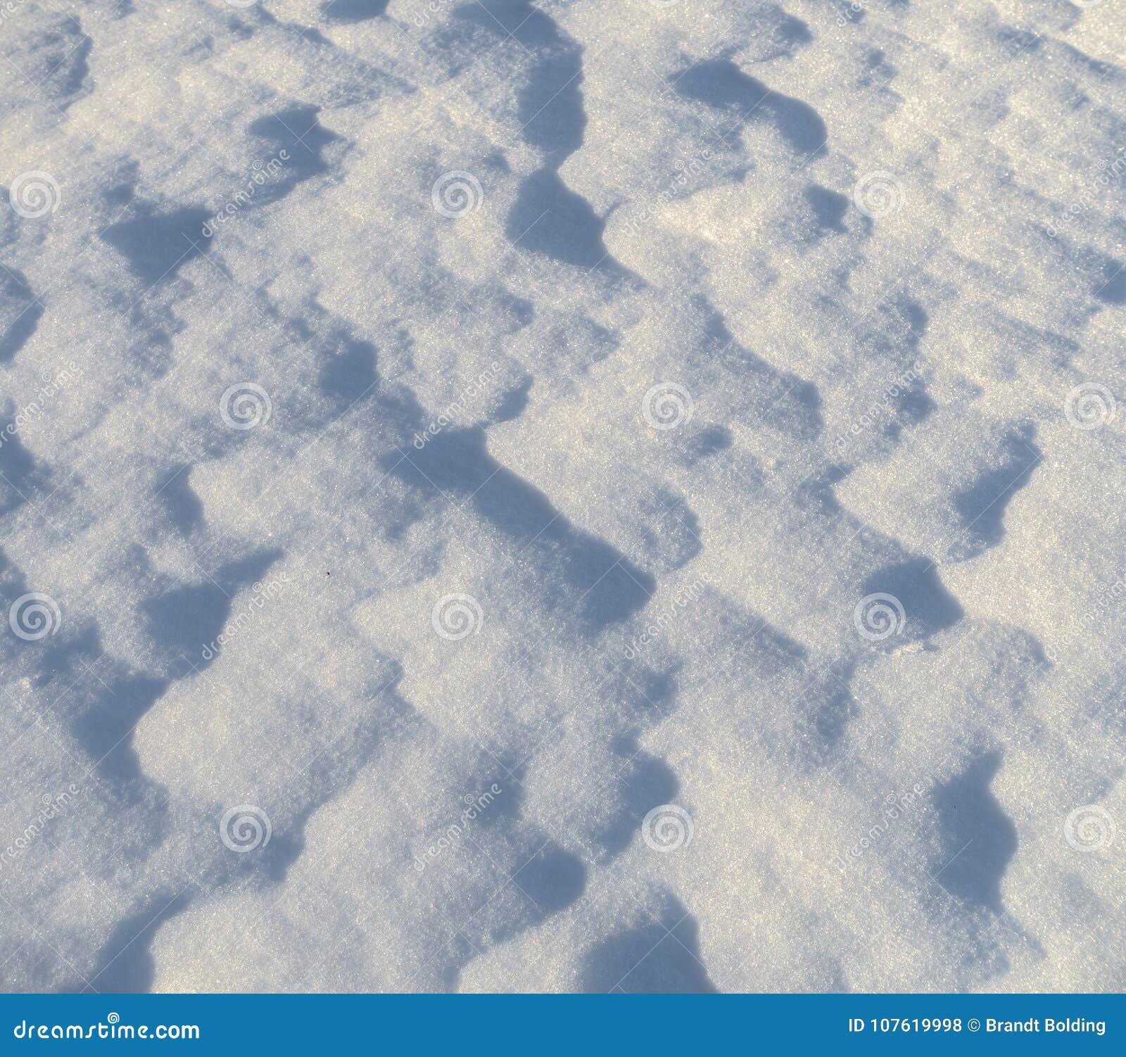 Wave Patterns in the Snow stock photo. Image of surface - 107619998