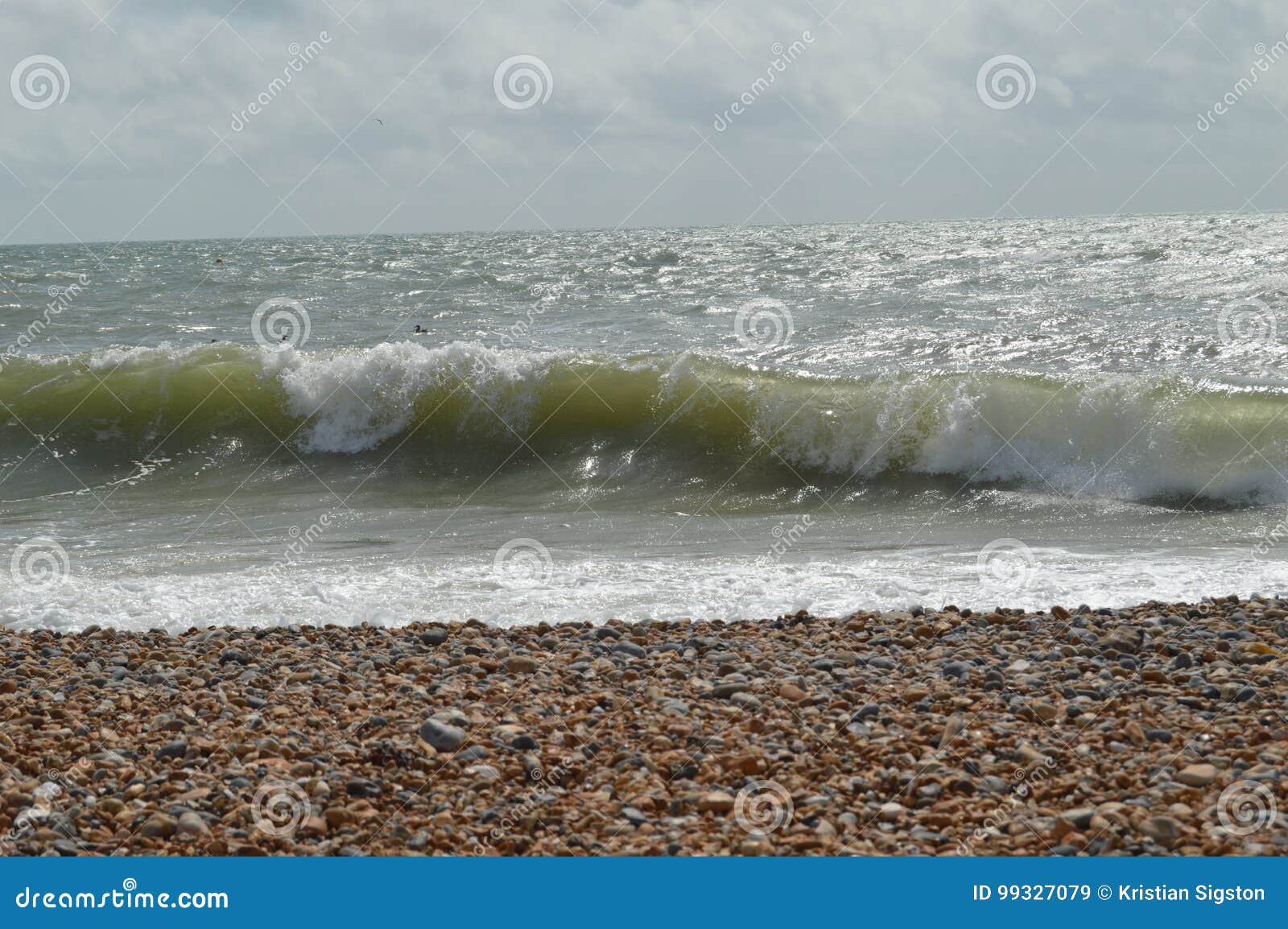 Wave rolling stock image. Image of pebbles, clouds, landscape - 99327079