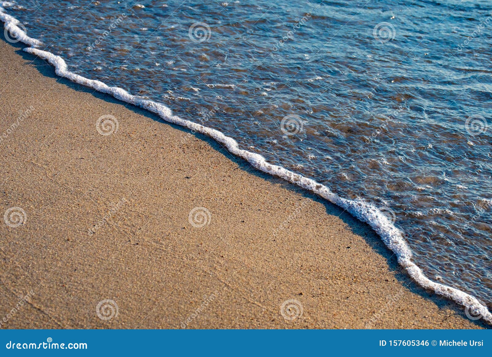 Wave on the sand stock photo. Image of blue, ocean, sandy - 157605346