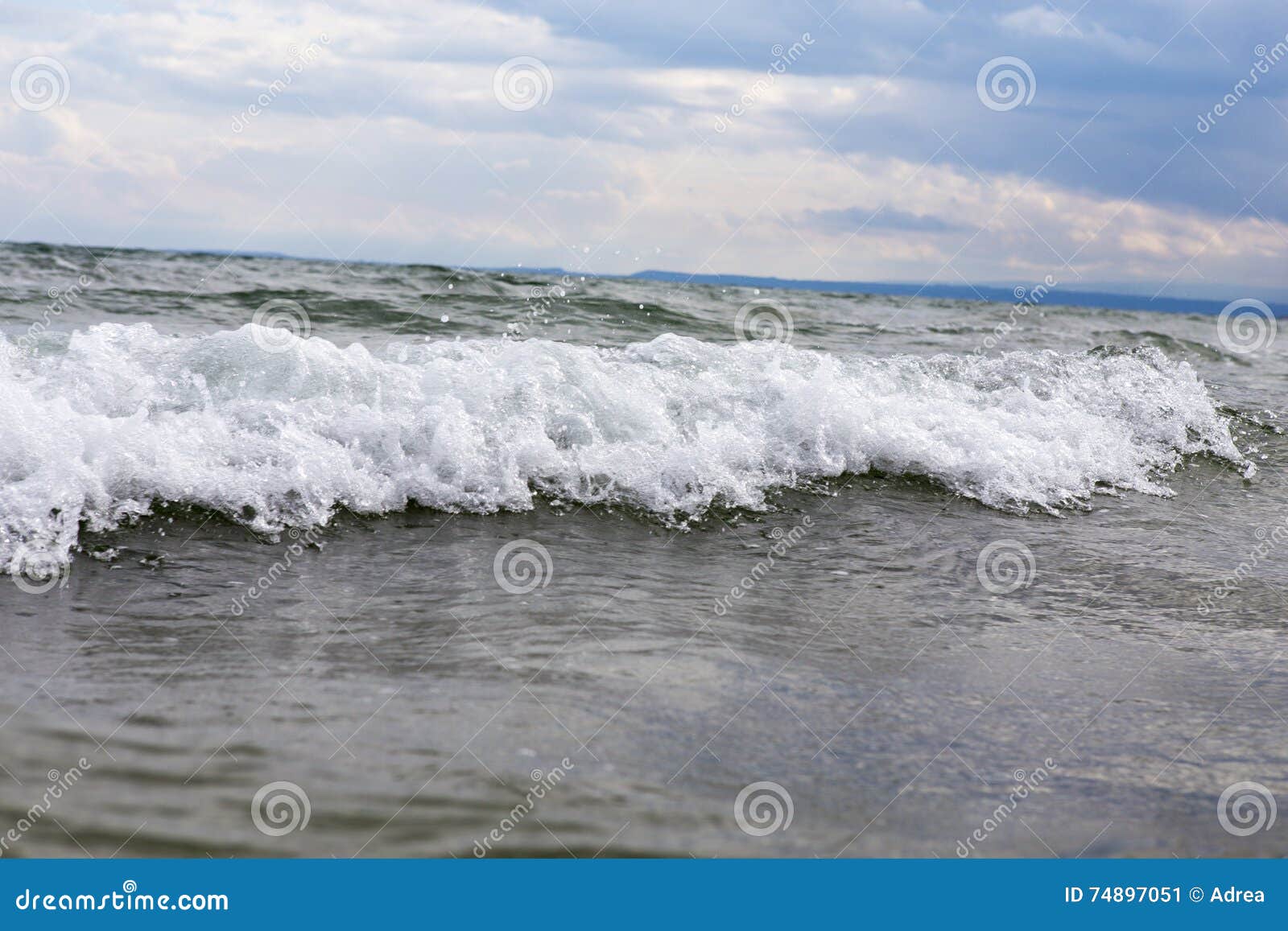 Sea wave hitting the shore stock image. Image of beautiful - 74897051