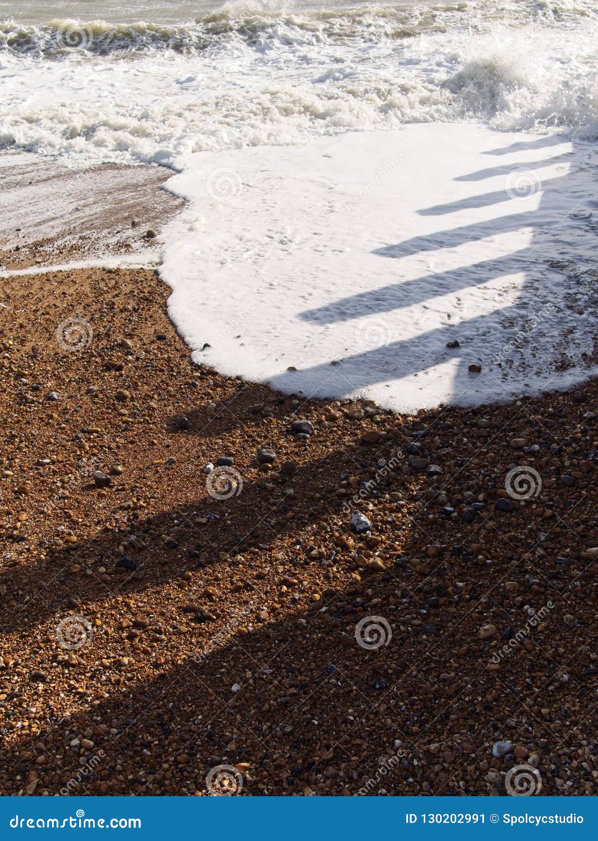 Wave of the Sea on the Sand Beach. Shadows of Wave Breakers Casting on ...