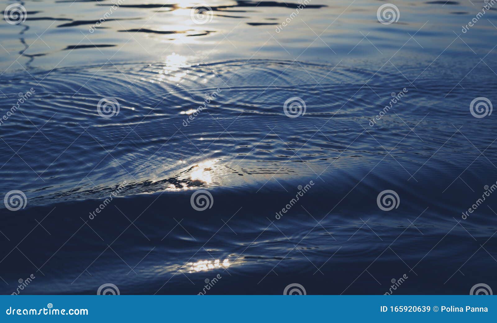 Wave on the Smooth Surface of the Lake in Blue Color. Stock Image ...