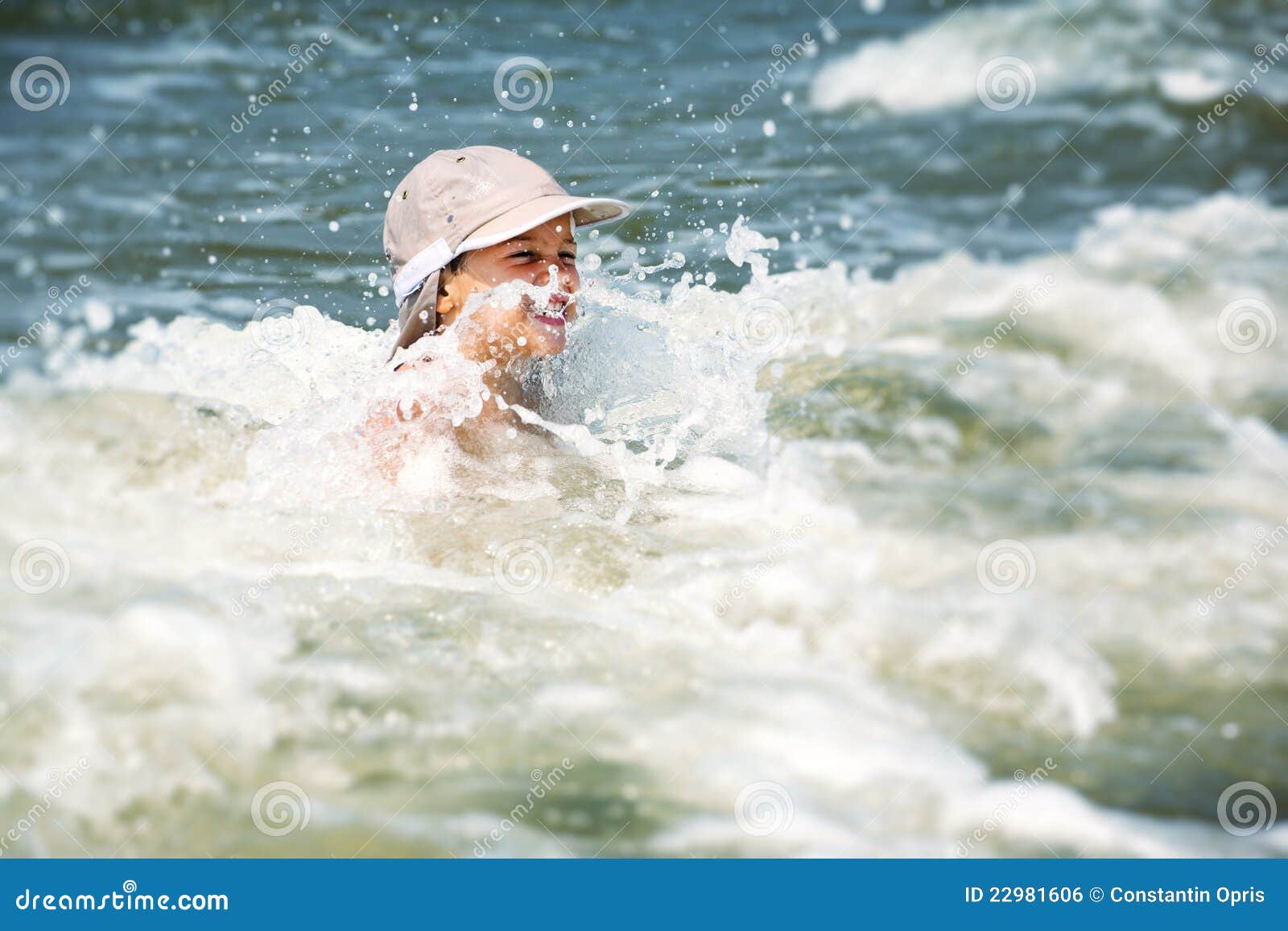 Wave splash stock photo. Image of crushing, childhood - 22981606