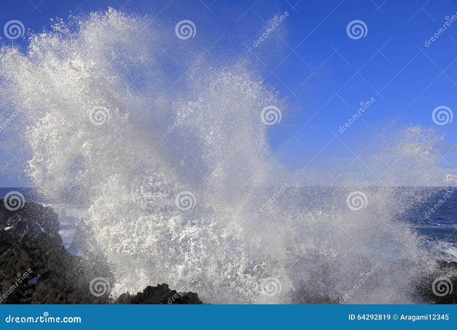Wave Splash with Rainbow on the Rocks Stock Image - Image of shore ...