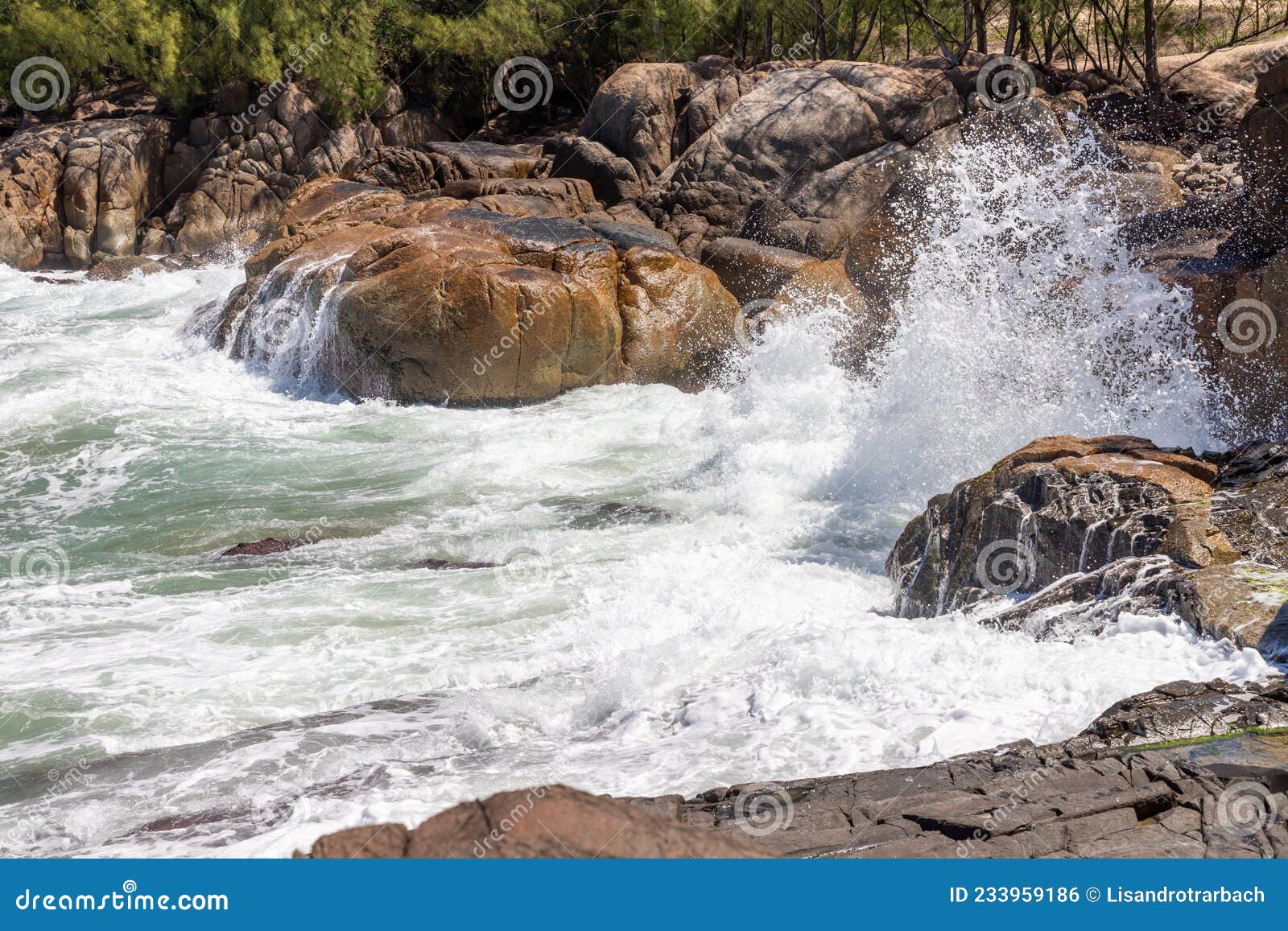 Wave splash and rocks stock photo. Image of garopaba - 233959186