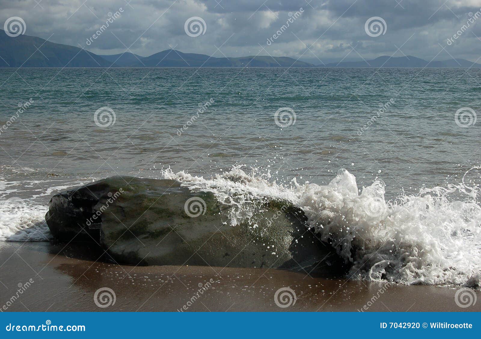Wave splashing irish rock stock photo. Image of relaxing - 7042920