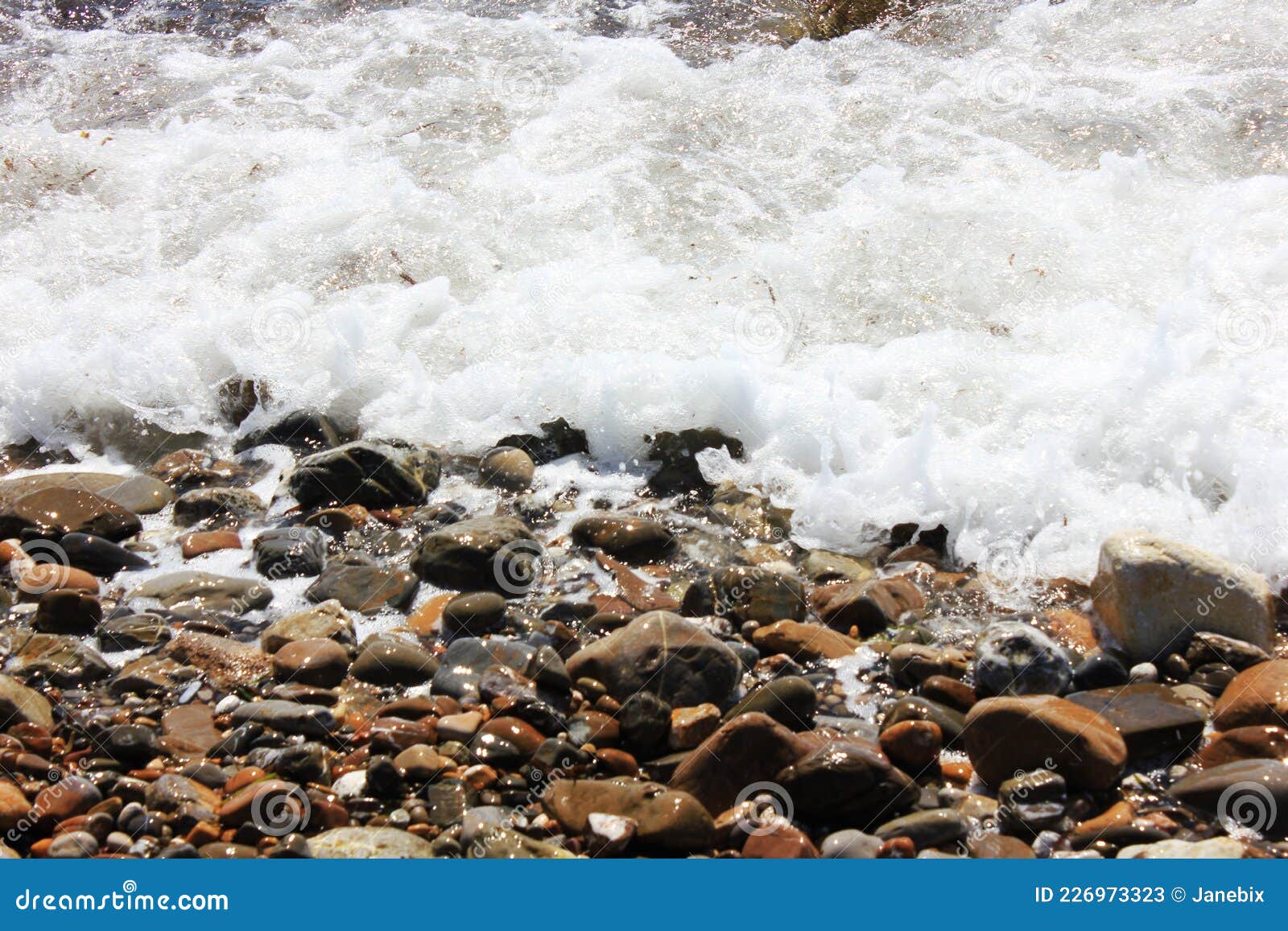 Wave with stone stock image. Image of beach, nature - 226973323