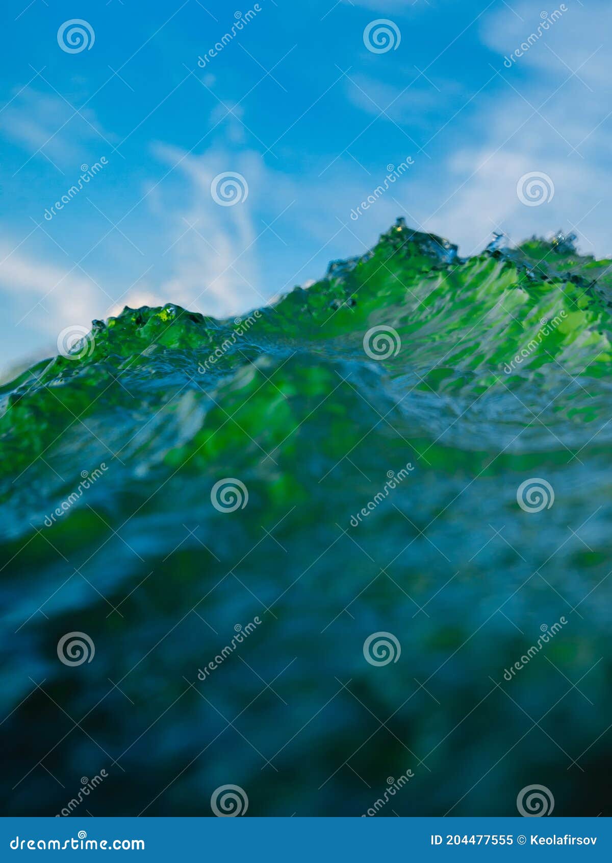 Wave Textures in Ocean. Green Wave with Sun Light and Sky Stock Image ...