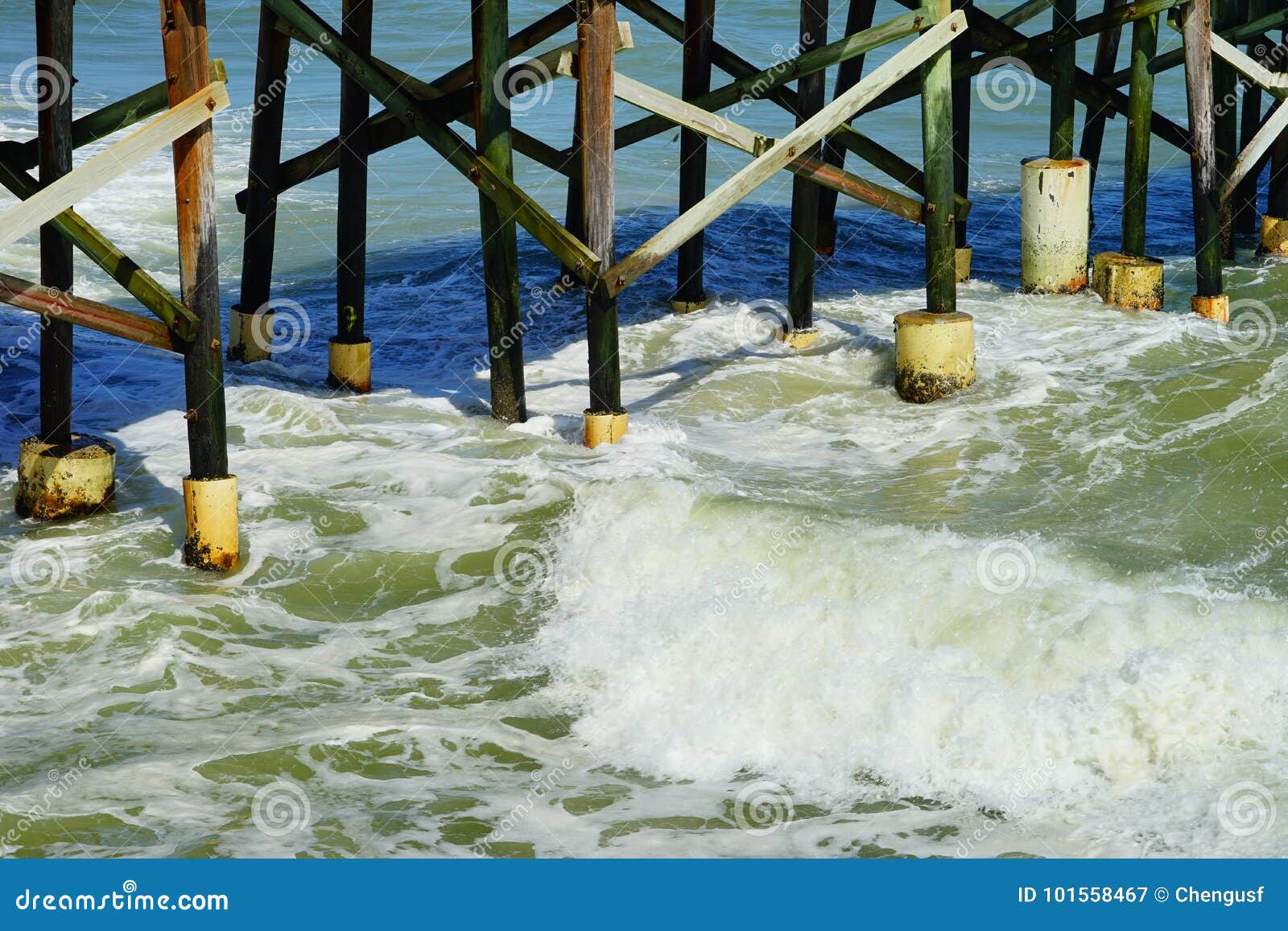 Wave tide and pier stock image. Image of beachfront - 101558467