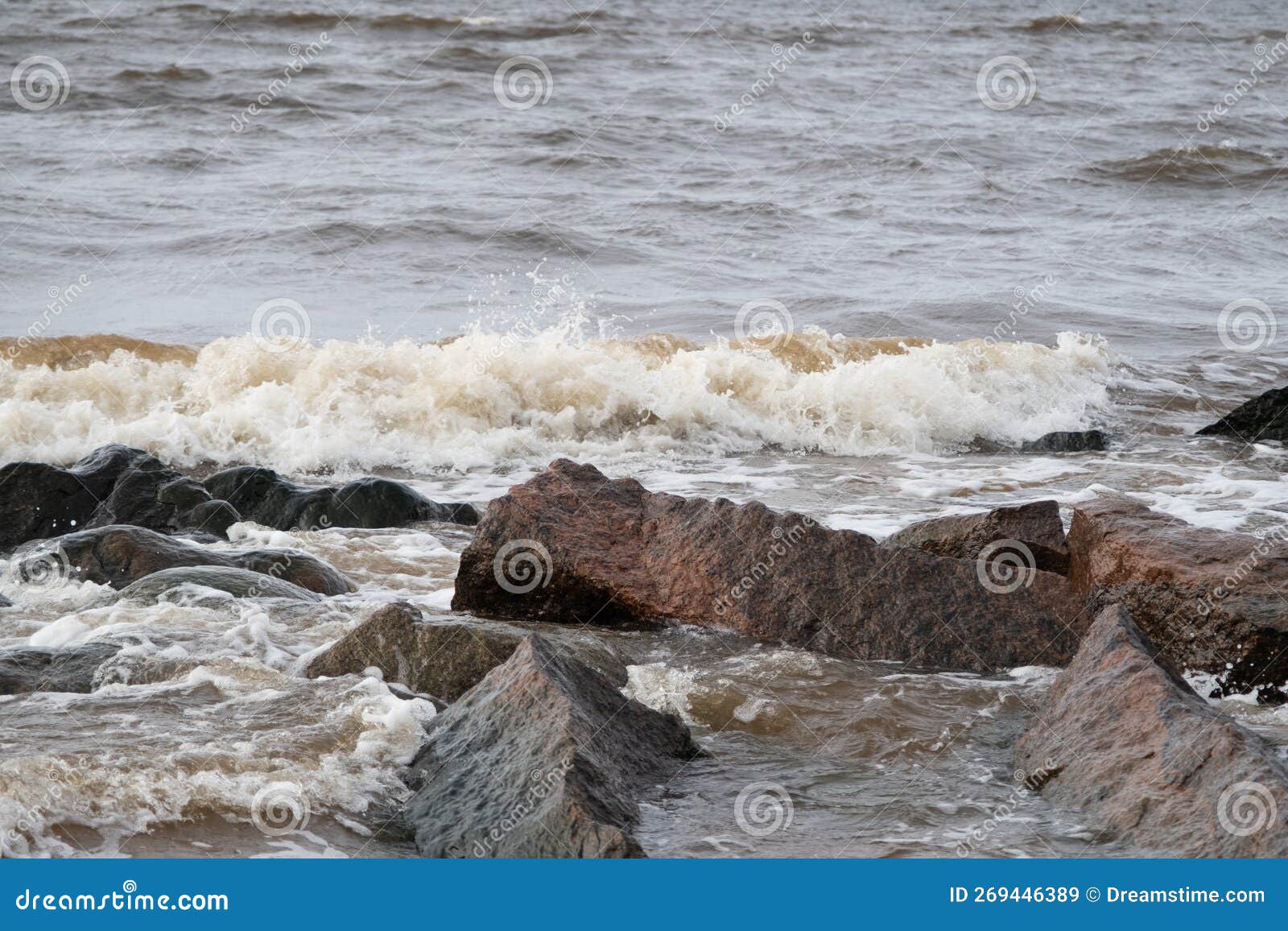 The Waves of the Baltic Sea Wash the Stones of Different Sizes on the ...