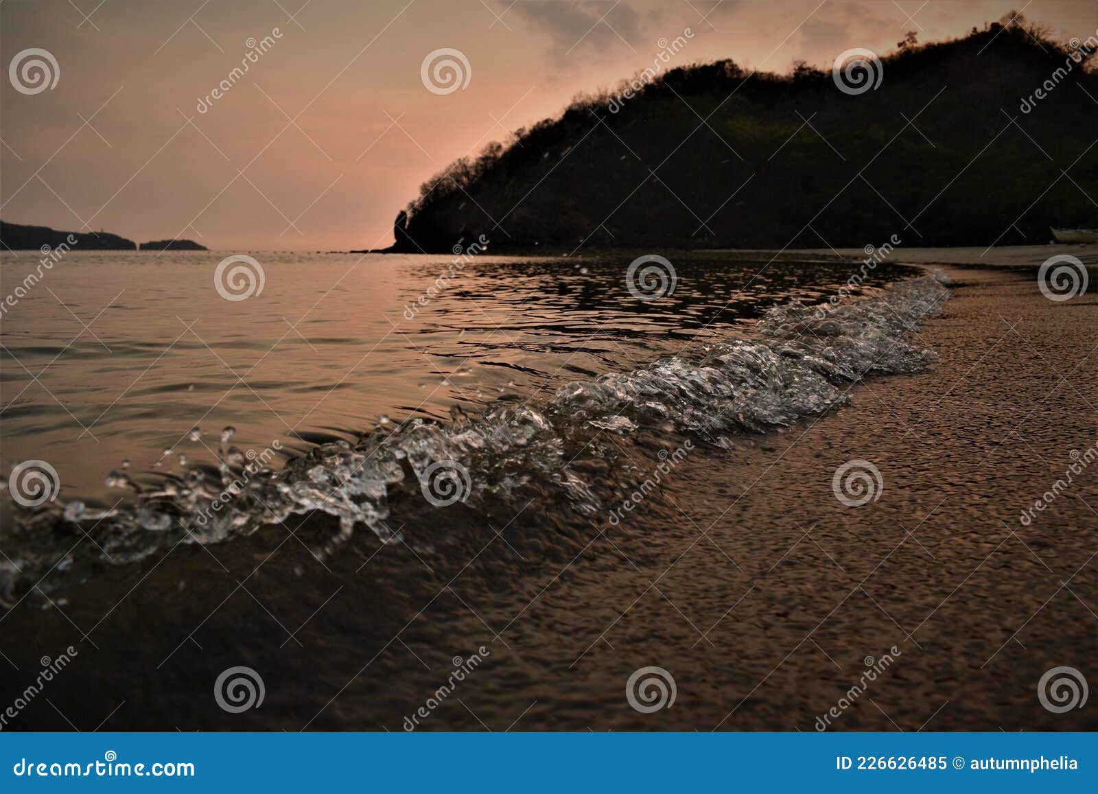 Waves at the Beach and the Sunset Reflection Stock Image - Image of ...