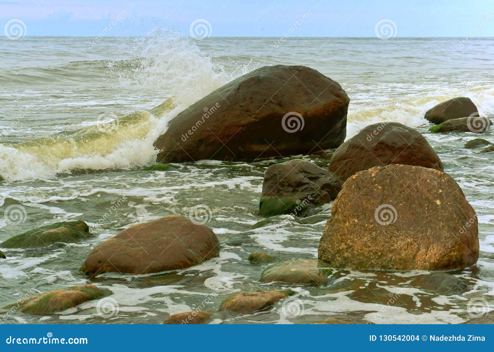 The Waves are Beating on the Coastal Boulders, the Sea Wave Breaks on ...