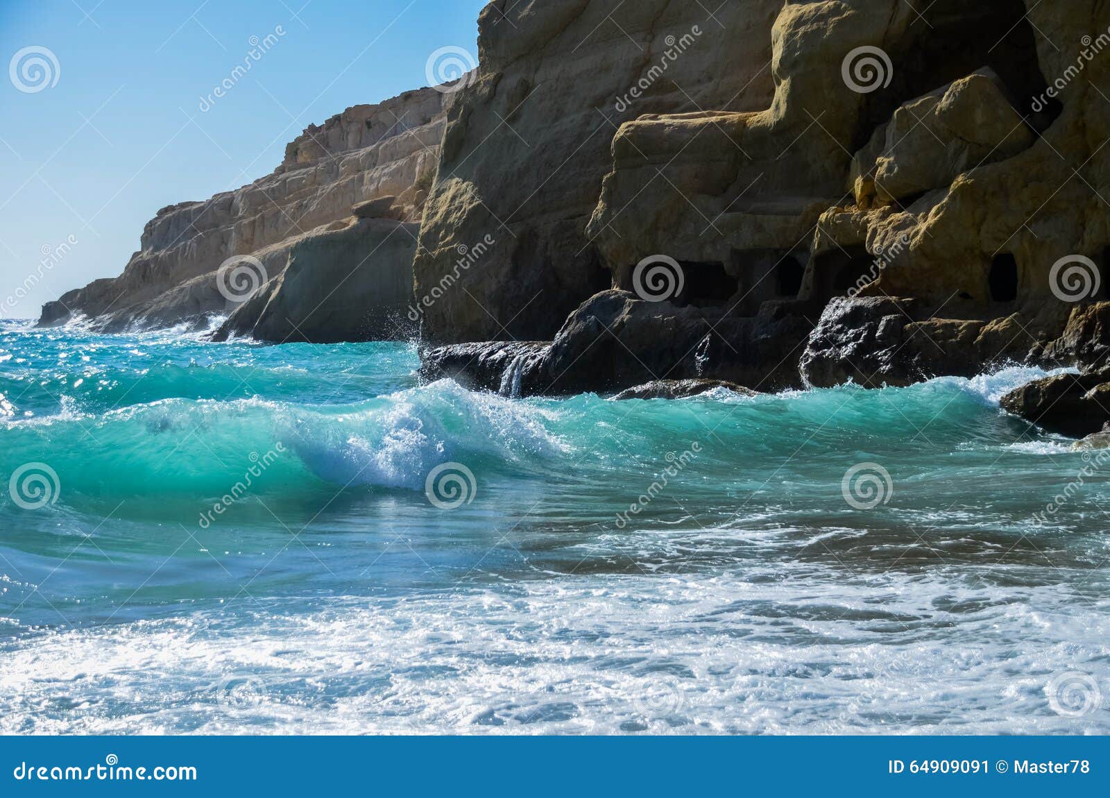 Waves beating on the shore stock image. Image of summer - 64909091
