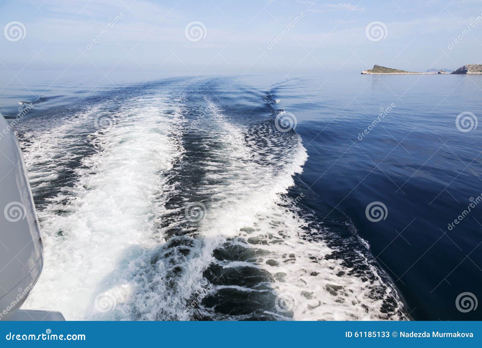 Waves behind boat underway stock image. Image of leisure - 61185133