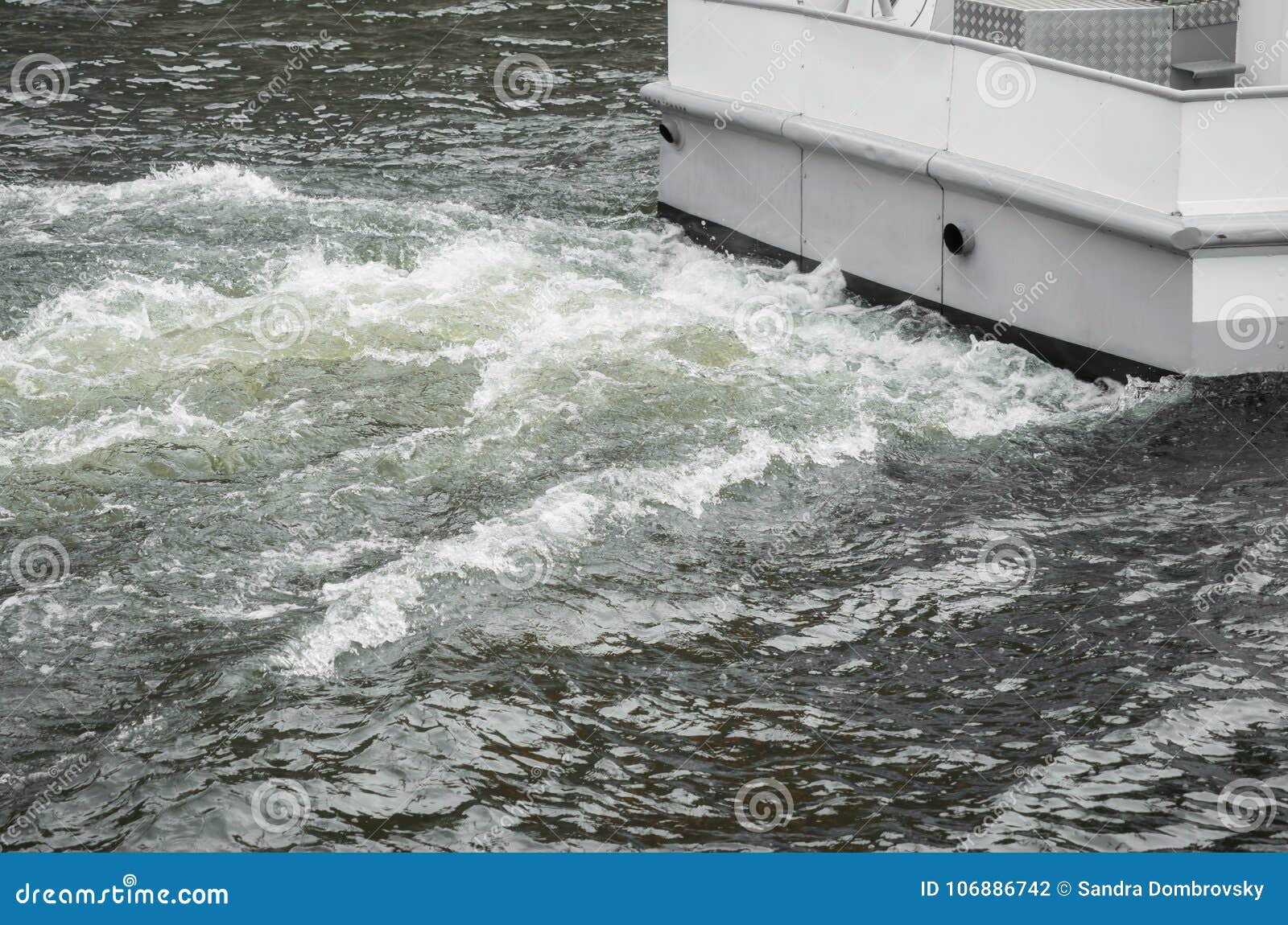Waves behind a moving boat stock photo. Image of background - 106886742
