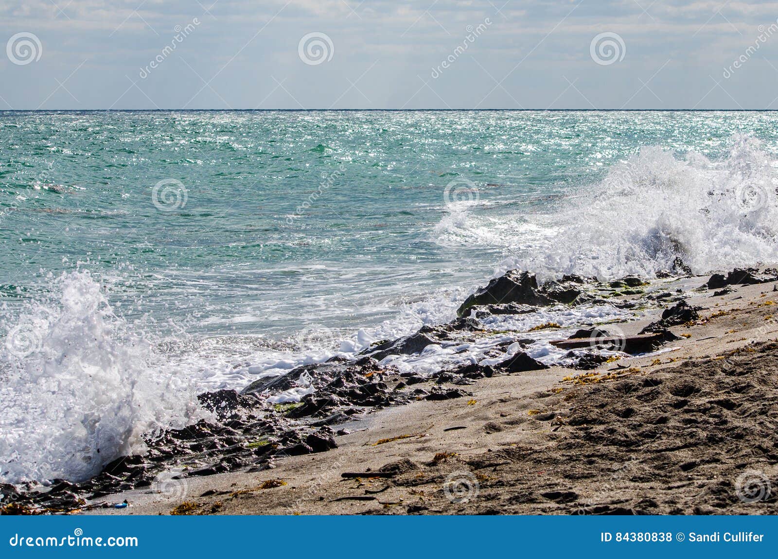 WAVES in the BLOWING ROCKS stock photo. Image of blowing - 84380838
