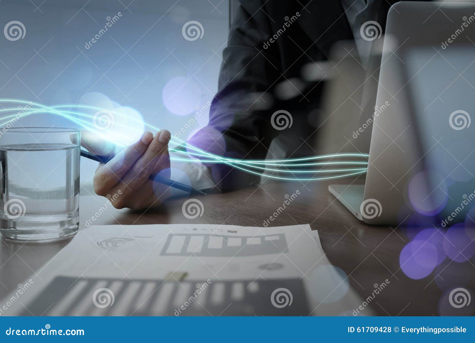 Waves of Blue Light and Businessman Using on Laptop Computer Stock ...