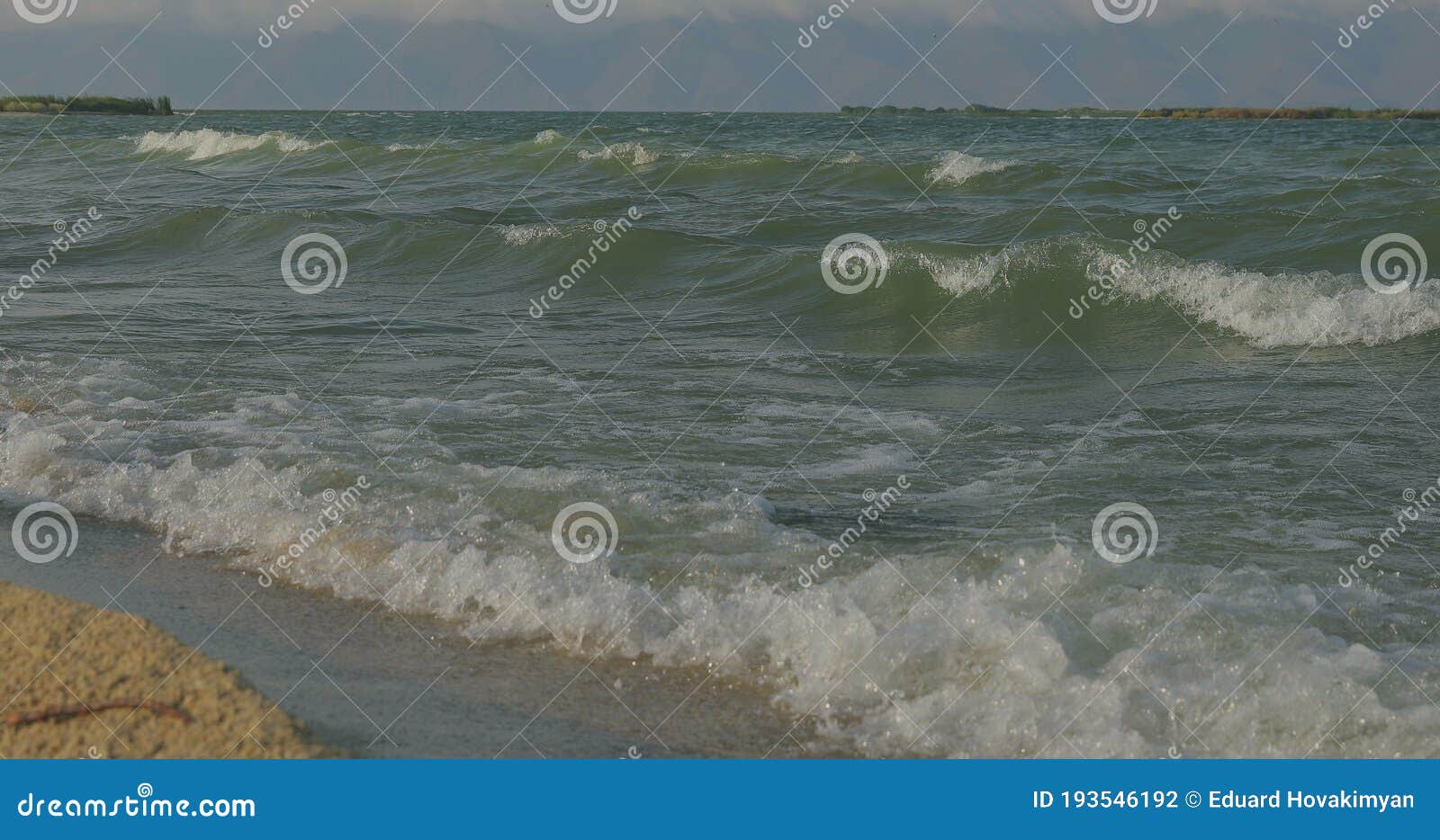 Waves Break on the Beach and Rocks Stock Photo - Image of quiet, coast ...