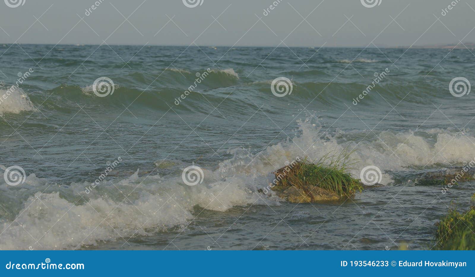 Waves Break on the Beach and Rocks Stock Image - Image of green, beach ...