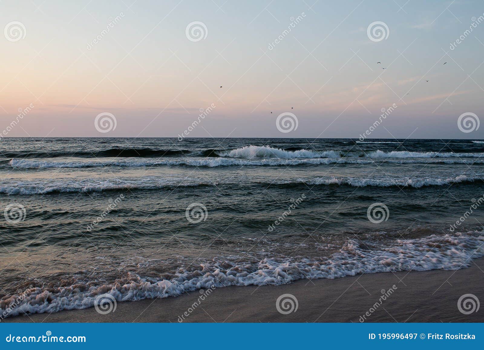 Waves break on the beach stock image. Image of door - 195996497