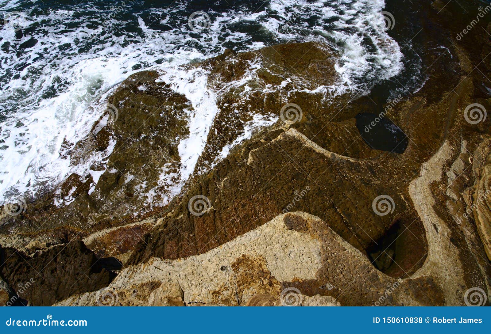 Waves Breaking on Ocean Cliffside Stock Photo - Image of waves, ocean ...