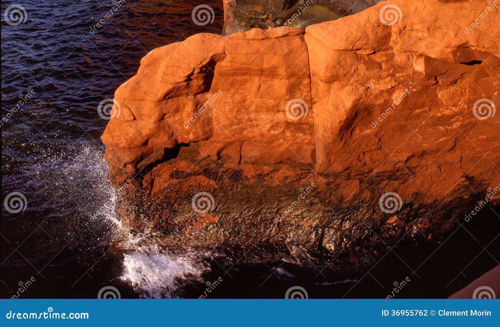 Waves Breaking on a Red Rock Stock Photo - Image of nature, colorful ...
