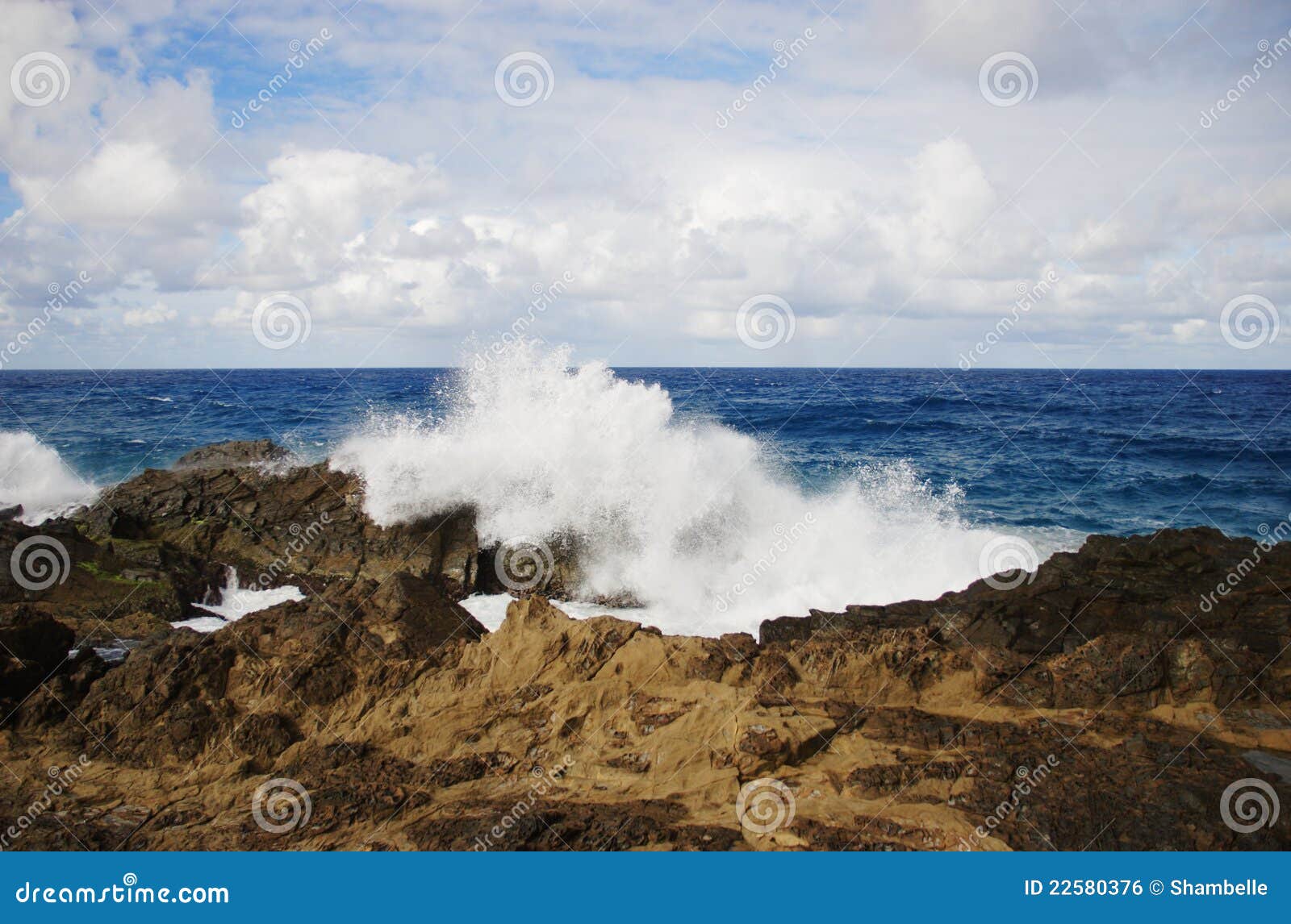 Waves Breaking on the Rocks Stock Photo - Image of beach, drops: 22580376