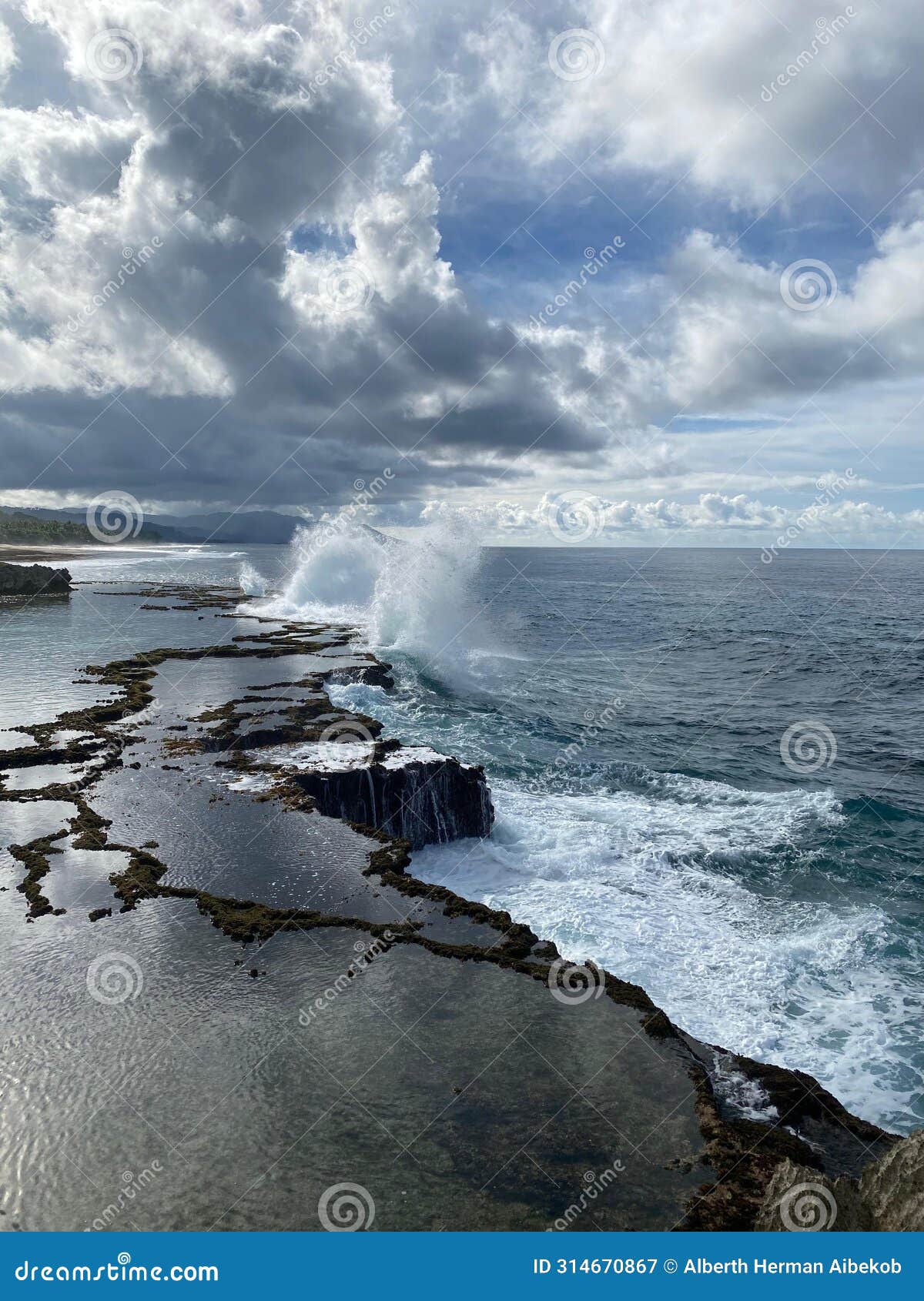Waves Breaking on the Rocks at the Edge of the Beach Stock Image ...
