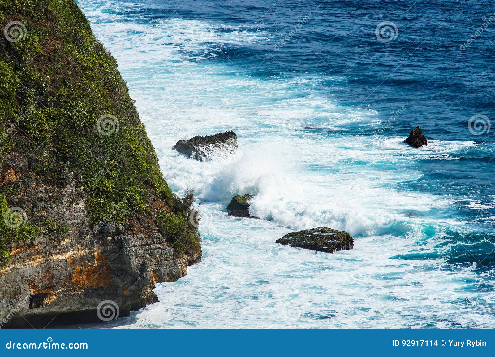 Waves Breaking on the Rocks. Uluwatu Bali, Indonesia Stock Photo ...