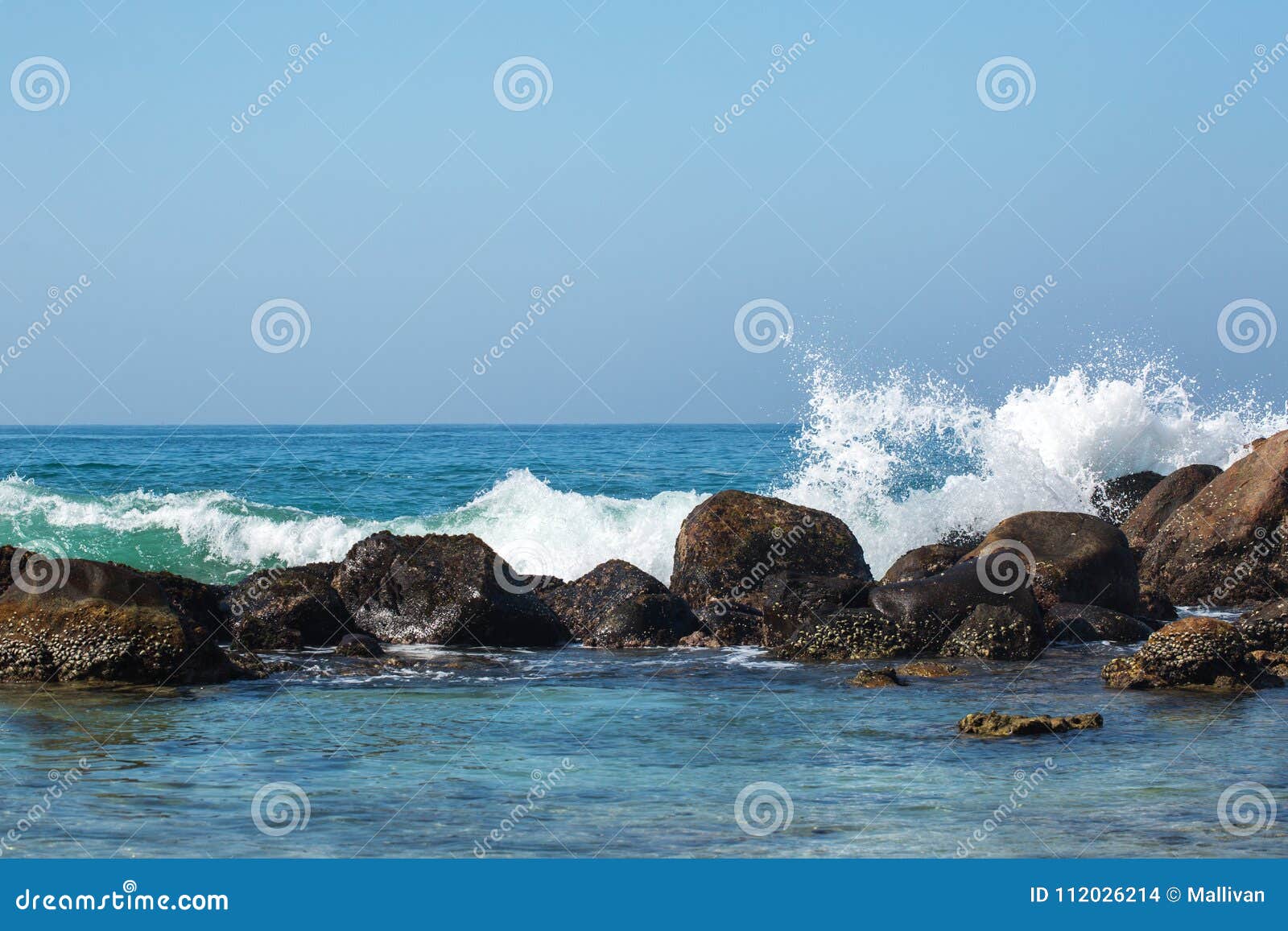 Waves are Broken Against Stones Stock Photo - Image of asia, bright ...