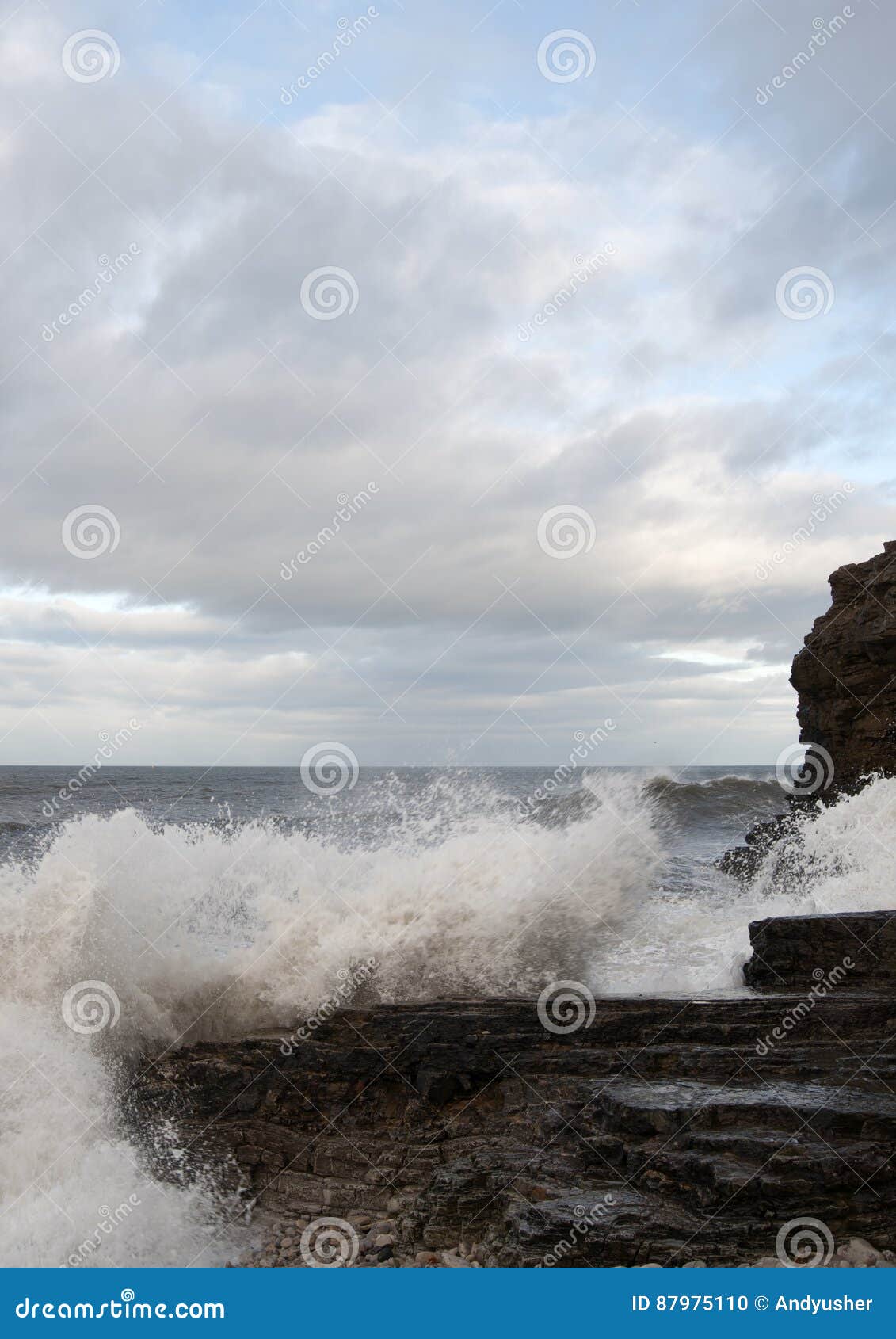 Waves Crash on the Rocks. stock photo. Image of horizon - 87975110