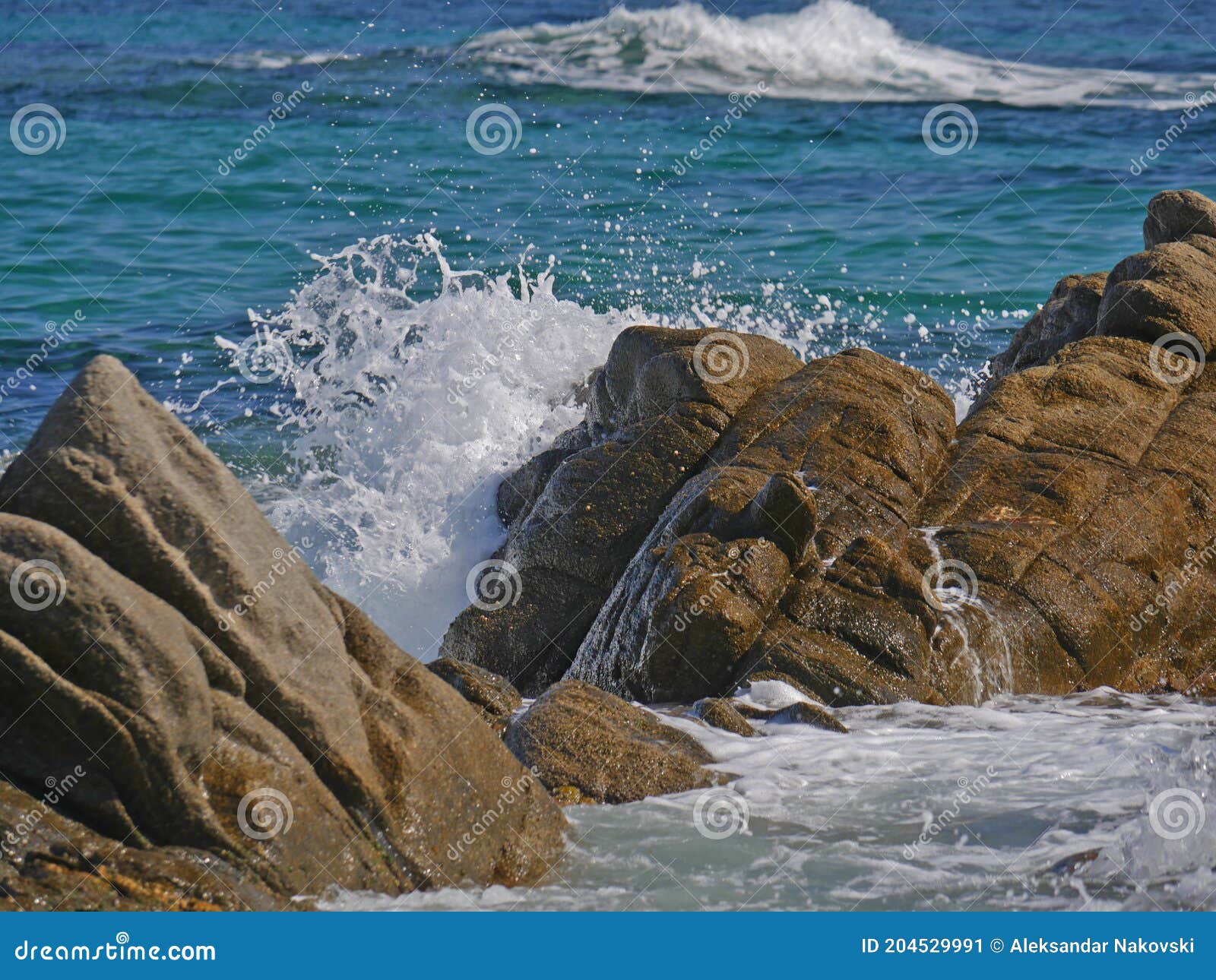 Waves Crashing Against the Rock Stock Image - Image of splashing ...