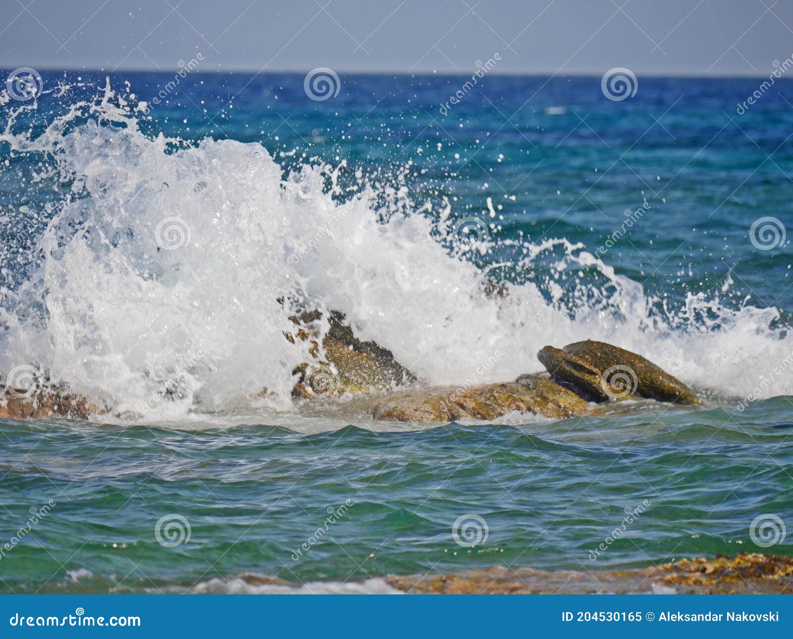 Waves Crashing Against the Rock Stock Image - Image of atlantic, white ...